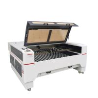China 4-Head Automatic Co2 Fabric Car PVC PU Shoes Upper Leather CNC Laser Cutting Cutter Machine for sale