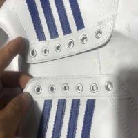 China Automatic Double Side Leather Canvas Rubber Shoe Upper Making Punching Eyelet Machine for sale
