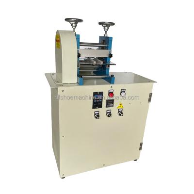 China Pneumatic Genuine PVC Leather Belt Strap Roller Embossing Machine Leather Belt Rolling Embossing Machine for sale