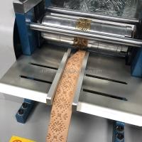 China Pneumatic Genuine PVC Leather Belt Strap Roller Embossing Machine Leather Belt Rolling Embossing Machine for sale