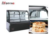 China Curve Type Front Opened Refrigerated Cake Display Case Pastry Display Chiller for sale