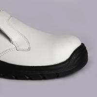 China Unisex Low Cut Safety Shoes Smash Resistant Comfortable EVA Metal Eyelets White Upper Black Outsole for sale