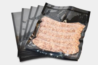 China 3 Mil Black Clear Chamber Vacuum Pouches for Meat Cheese Sausage Packaging for sale