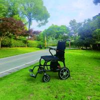 China Lightweight 11.5kg Electric Wheelchair with Full Carbon Fiber Frame and Extended Seat for sale