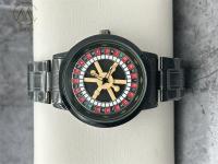 China Round Case Shape Stainless Steel Strap Quartz Watch with Black Alloy Bezel for sale