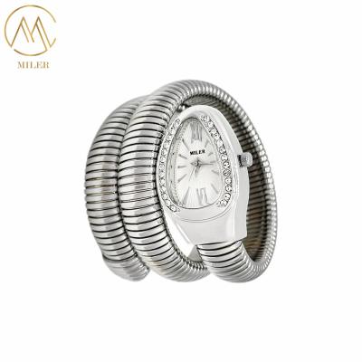 China Gold And Silver Band Color Lady Quartz Watch with Loving Shape Case and Analog Display for sale