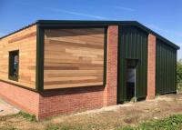 China Pre Engineered Smallholding Odm Steel Structure Commercial Building for sale