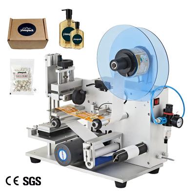 China Desktop Semi Automatic Flat Labeling Machine Paper Boxes Packaging Bags And Bottles Label Applicator for sale