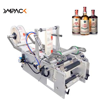 China Manual Desktop Label Applicator Machine Electric Semi Automatic Labeling Machine For Round Bottles for sale