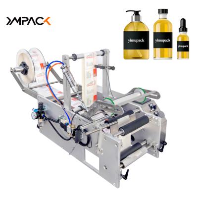 China Desktop Manual Label Applicator Machine Sticker Labelling Machine For Round Bottles for sale
