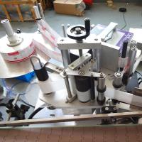 China Plastic Cup Automatic Labeling Equipment Sticker Machine For Small Business 200kg for sale