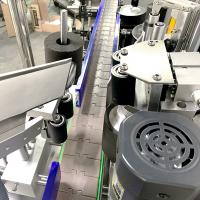 China Automatic 2 Head Round Bottle Label Sticker Machine Food And Cosmetic Sticker Labeling Machine For Plastic Bottles for sale