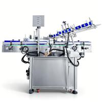 China Double Head Automatic Labeling Machine Round Bottle Beer And Coke Bottle Labeler Machine With Bottle Clamping Mechanism for sale