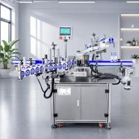 China Double Head Automatic Labeling Machine Round Bottle Beer And Coke Bottle Labeler Machine With Bottle Clamping Mechanism for sale