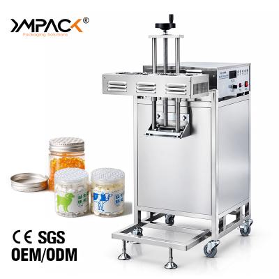 China LM2000 Aluminum Foil Induction Sealing Machine Full Automatic Can Sealing Machine Biscuits and Candy Sealing Machines for sale