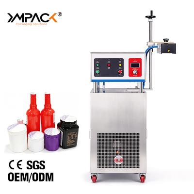 China Factory Direct LM3000 Electromagnetism Induction Sealing Machine Aluminum Foil Cup Sealing Machine for Juice Coffee and Cookies for sale