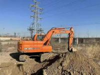 China Used Doosan DX120 12Ton Excavator - Ideal for Earthmoving and Road Construction for sale