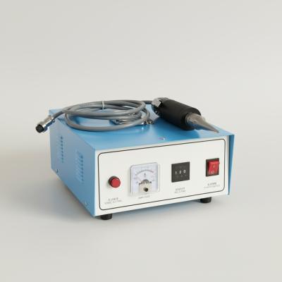 China New SL Portable Handheld 1500W 220V/110V 35KHz Ultrasonic Spot Welder for sale