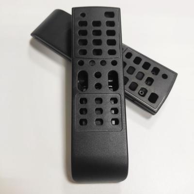 China Custom ABS Plastic Injection Molding Service 14.6x4.5x1.6mm Smooth Surface Remote Control Shell for sale
