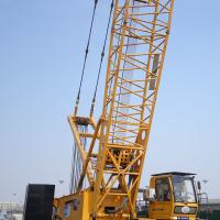 China Hydraulic Crawler Crane with 3600kNm Tamping Capacity 24-84m Heavy Boom Length and 40% Maximum Gradeability for sale