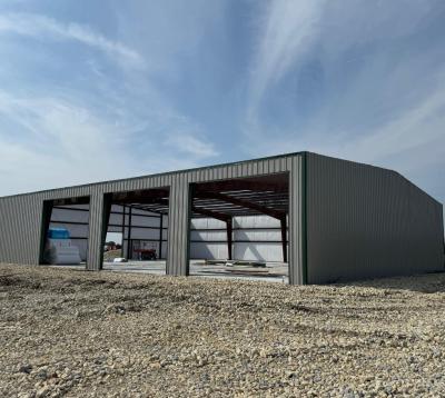China Custom Steel Structure Warehouse with Q235/Q345 Steel - Sliding Doors, Multiple Sizes & Custom Colors for Industrial Storage for sale