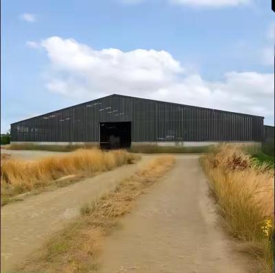 China Lanjing Steel Structure Cow Shed - Prefabricated Metal Barn with Q235B/Q355B Steel, 1000sqm Minimum Order, Earthquake Resistant Design for sale