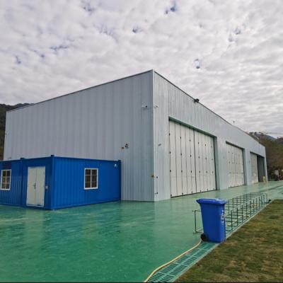 China Industrial Steel Structure Warehouse Building - Prefab Metal Construction with Large-Span Design and Hot-Dip Galvanized Frame for sale