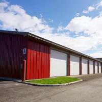 China LANJING Prefab Steel Warehouse 1000-2000 sqm Portal Frame Structure with Custom Load Capacity for Industrial Storage for sale
