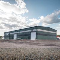 China Premium Custom Prefab Steel Structure Building Long Lasting Low-Cost and Easy Install Warehouses for sale