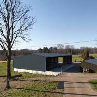 China Modern Design Prefab Dairy Cow Shed Steel Structure Farm House With Cow Stable Easy Installation for sale