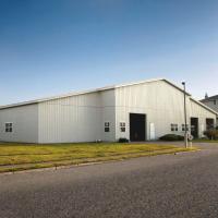 China Prefabricated Cost Effective Commercial and Industrial Steel Construction Ready Made Warehouses Building for sale