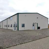 China High-Strength Quick-Assembly Prefab Steel Warehouse 5000 kg Roof Load Capacity for sale