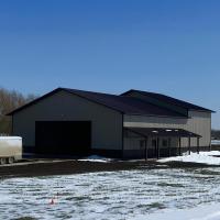 China Prefabricated Steel Structure Warehouse 12-40m Span 50-200mm Sandwich Panel Earthquake Resistant 7-9 Grade for sale