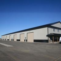 China Prefabricated Steel Structure Warehouse 12-40m Span 50-200mm Sandwich Panel Earthquake Resistant 7-9 Grade for sale