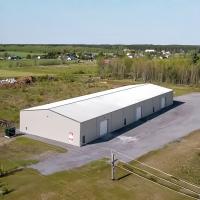 China Custom Prefabricated Steel Structure Warehouse 12-40m Span Sandwich Panels 50 Year Lifespan for sale