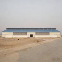 China Hot Dip Galvanized Steel Cattle Barn 6-25m Span Modular Livestock Shed for sale