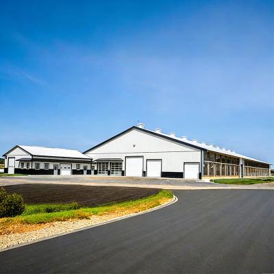China Galvanized Steel Cow Shed 12-30m Span Corrosion-Resistant Shelter for Humid Farming for sale