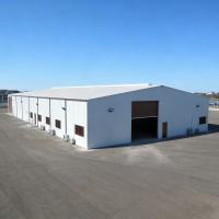 China Prefab Steel Frame Warehouse Custom Size for Heavy Duty Goods Storage Column-Free for sale