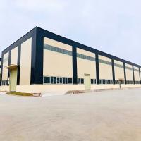 China Prefab Steel Frame Warehouse Custom Size 8-40m Span 3-8m Eave Height Heavy Duty Fireproof Anti-Corrosion for sale
