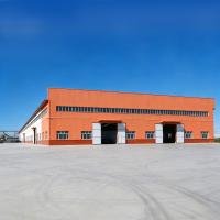 China Fast Assemble Steel Structure Workshop Economical Prefab Industrial Building Eave Height Customization for sale