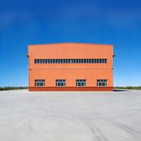 China Fast Assemble Steel Structure Workshop Economical Prefab Industrial Building Eave Height Customization for sale