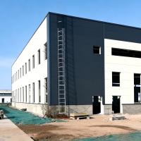 China Fast Assemble Steel Structure Workshop Economical Prefab Industrial Building 8-40m Span for sale
