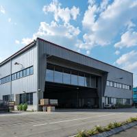 China Fast Assemble Steel Structure Workshop Economical Prefab Industrial Building Lightweight Steel Frame Large Span for sale