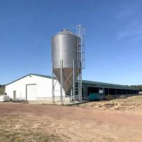 China Customizable Multi-Bay Steel Structure Cow Barn for Commercial Ranch Thermal Insulation Hot-Dip Galvanized for sale