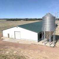 China Customizable Multi-Bay Steel Structure Cow Barn for Commercial Ranch Thermal Insulation Hot-Dip Galvanized for sale