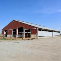 China Thermal Insulation Customizable Multi-Bay Steel Structure Cow Barn for Commercial Ranch Thermal Insulation for sale