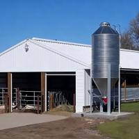 China Wind/Snow Resistant Customizable Multi-Bay Steel Structure Cow Barn for Commercial Ranch Thermal Insulation for sale