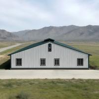 China Hot-Dip Galvanized Customizable Multi-Bay Steel Structure Cow Barn for Commercial Ranch Beef Cattle Fattening for sale