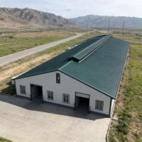 China Hot-Dip Galvanized Customizable Multi-Bay Steel Structure Cow Barn for Commercial Ranch Beef Cattle Fattening for sale
