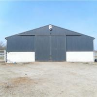 China Dairy Cow Breeding Customizable Multi-Bay Steel Structure Cow Barn for Commercial Ranch Beef Cattle Fattening for sale